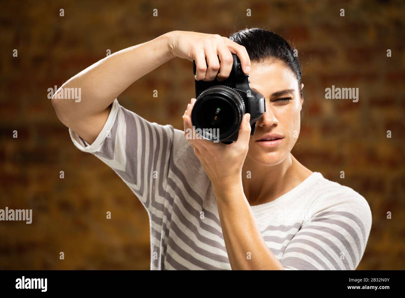 Female photographer at work hi-res stock photography and images - Alamy