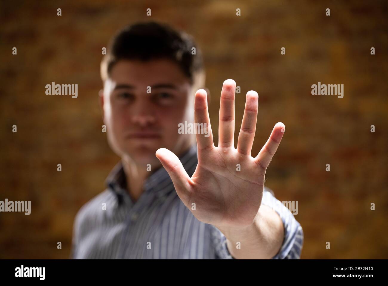 Arm hand raised hi-res stock photography and images - Alamy