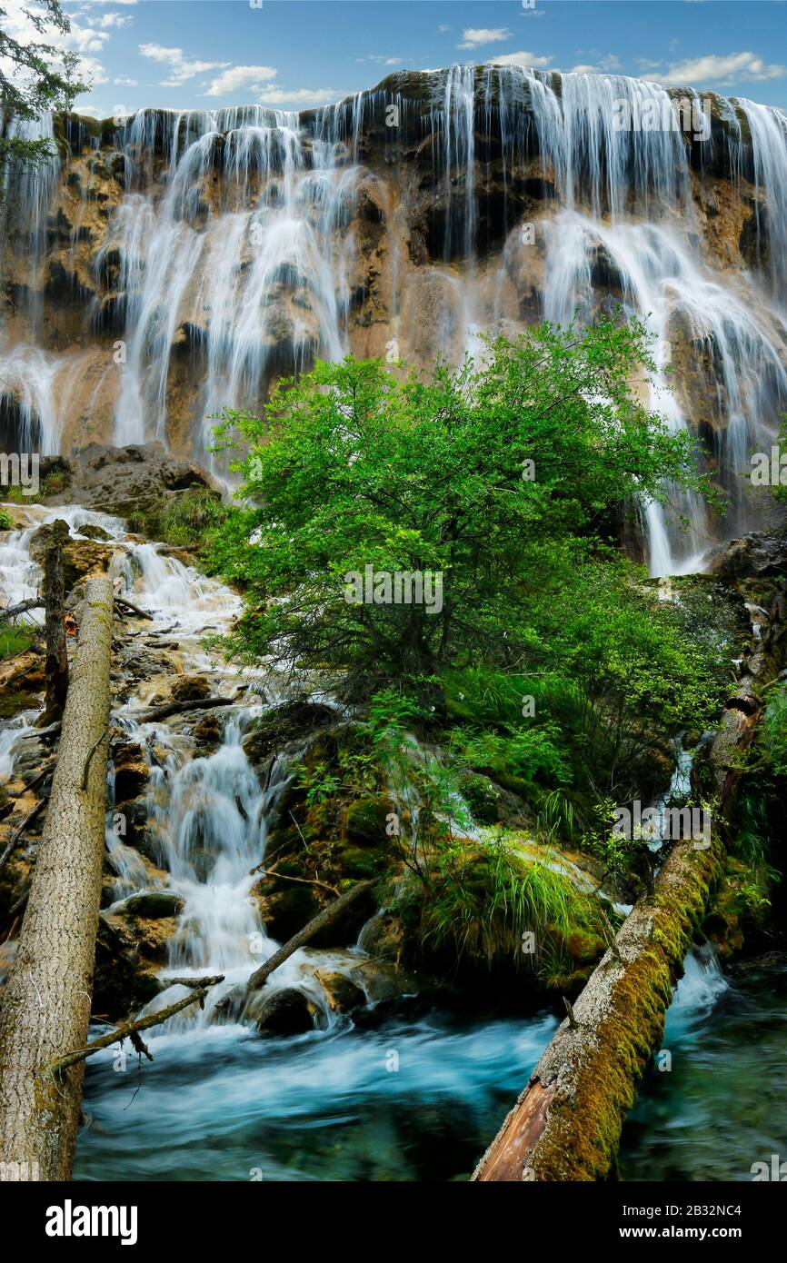 view of colorful lake and waterfall in jiuzhaigou national park ...