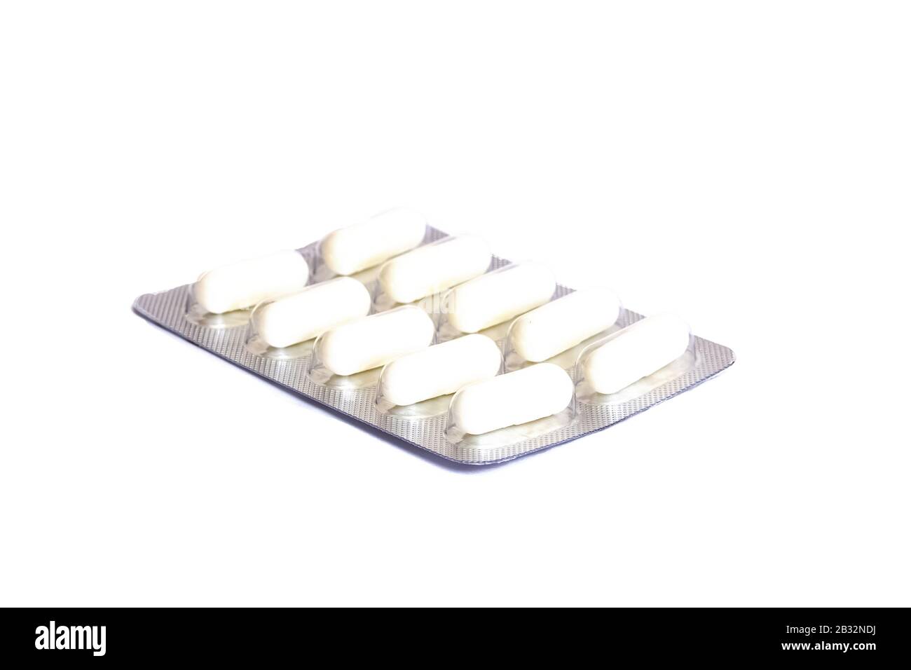 Packing of white tablets isolated on white background Stock Photo - Alamy