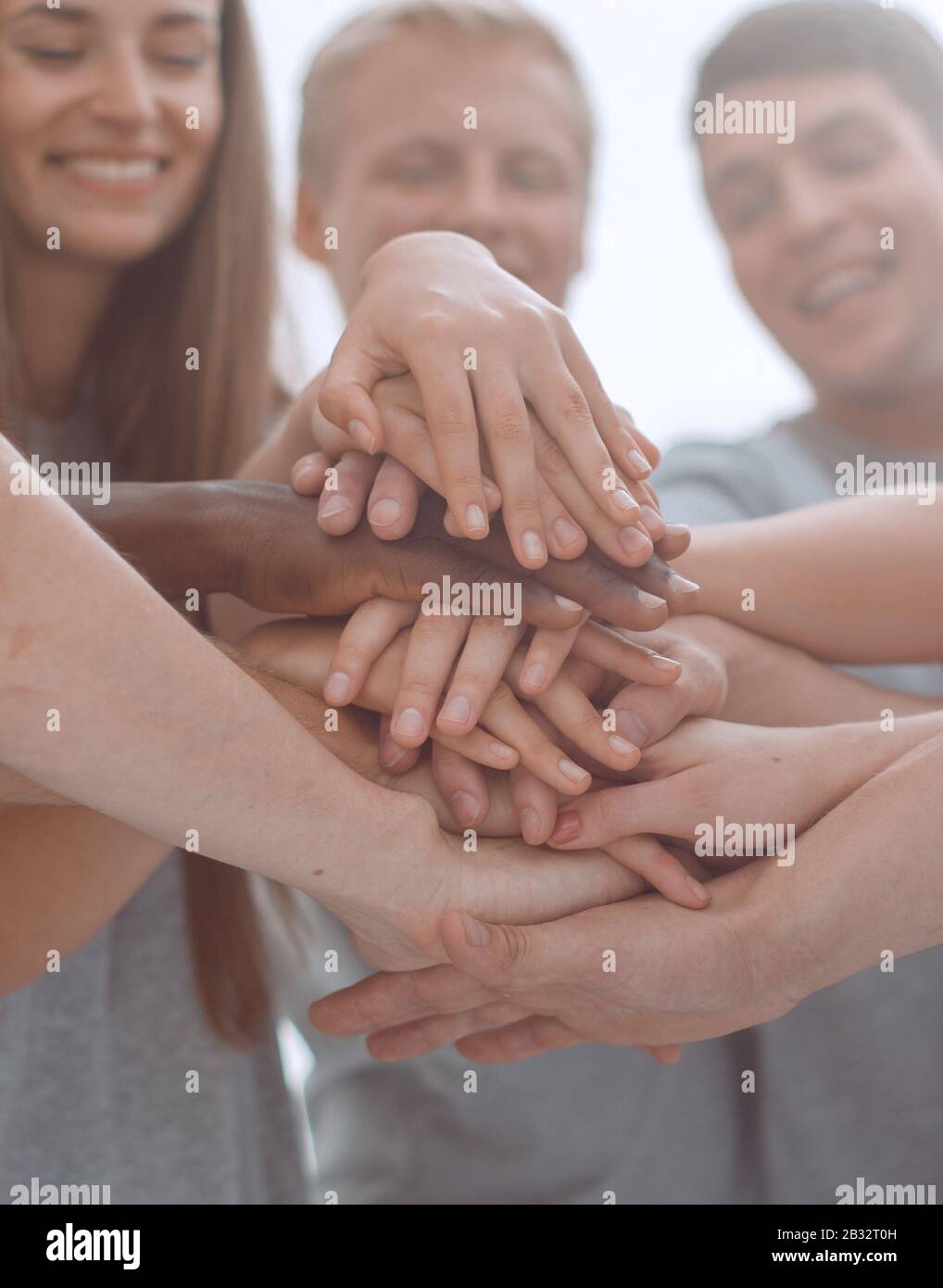 Team mates hands hi-res stock photography and images - Alamy