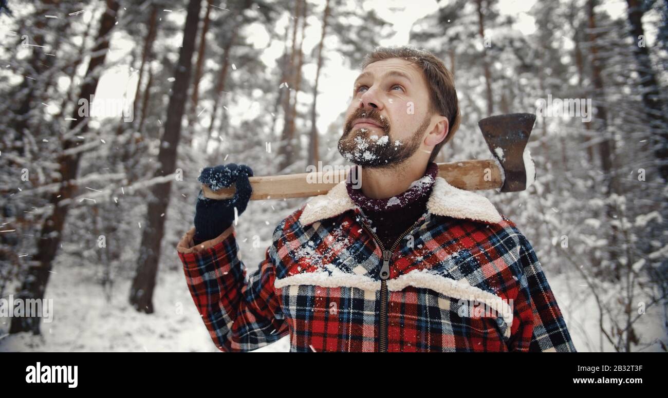 Man with axe front view Stock Photo - Alamy