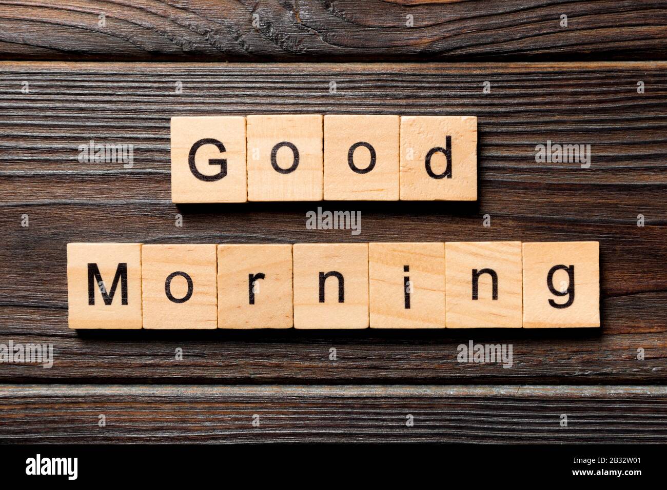 good morning word written on wood block. good morning text on table ...