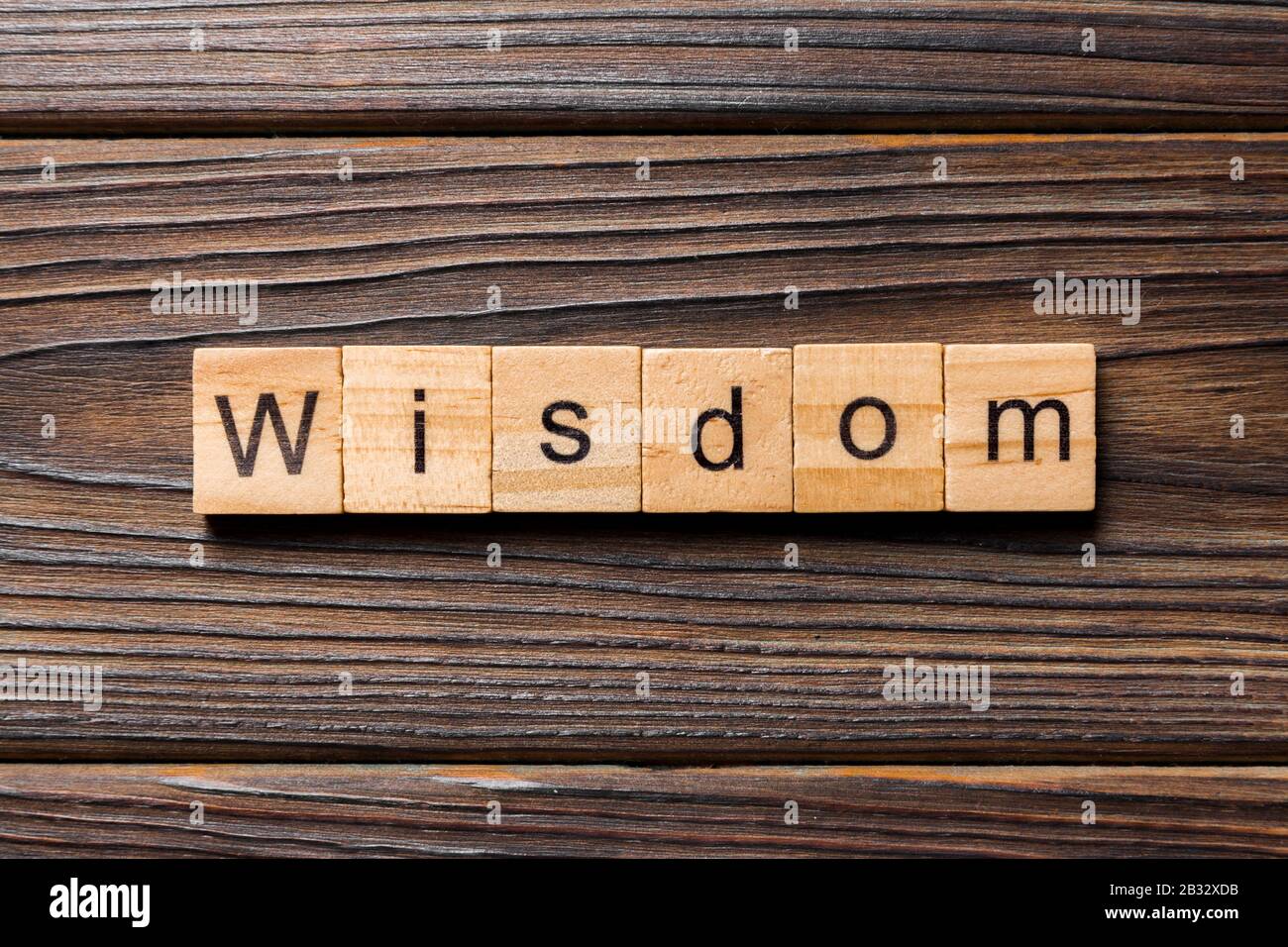 wisdom word written on wood block. wisdom text on table, concept Stock ...