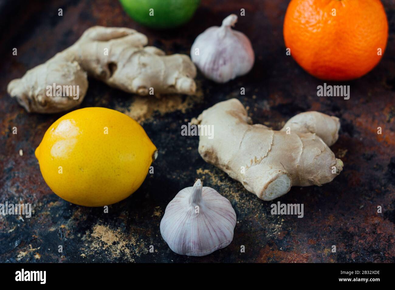 Citrus fruits with garlic and ginger root Stock Photo - Alamy
