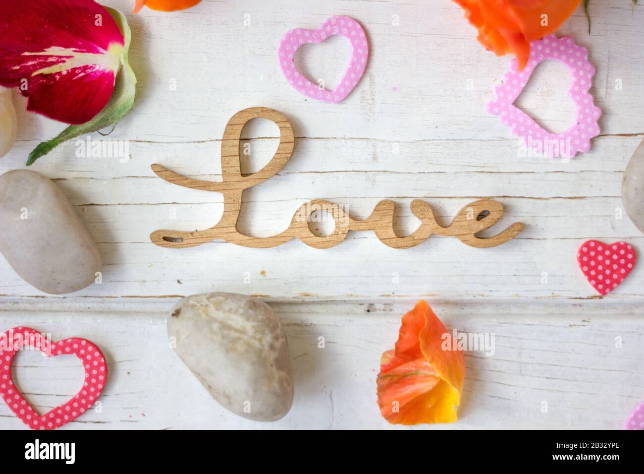 Love background - rose and cloves for Valentine's day Stock Photo - Alamy