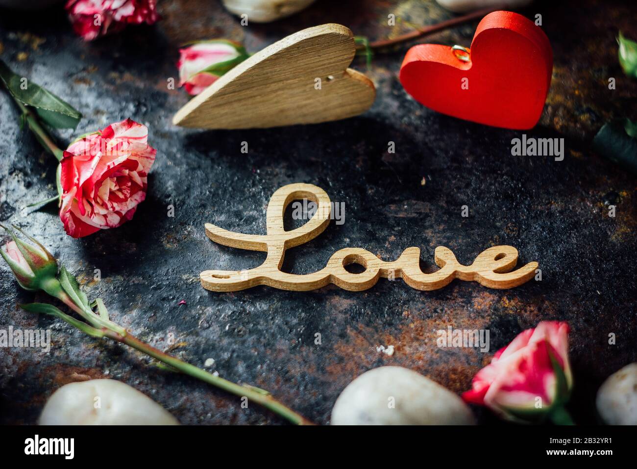 Valentine's day background on rustic surface Stock Photo - Alamy