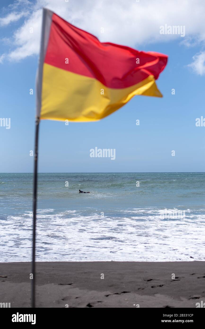People swimming between the flags in Oakura Beach, Taranaki, New ...