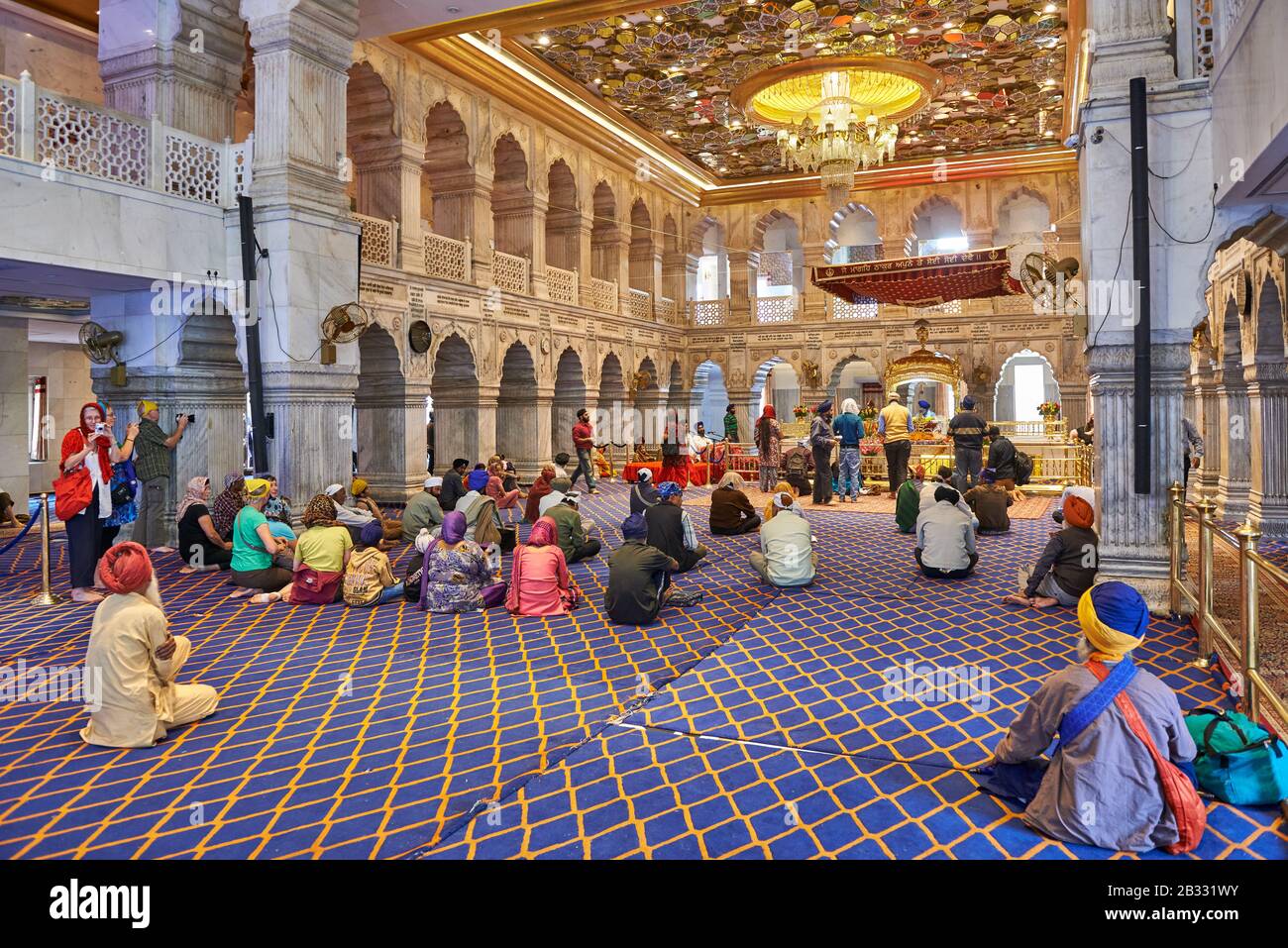 Sikhs Praying In Gurdwara