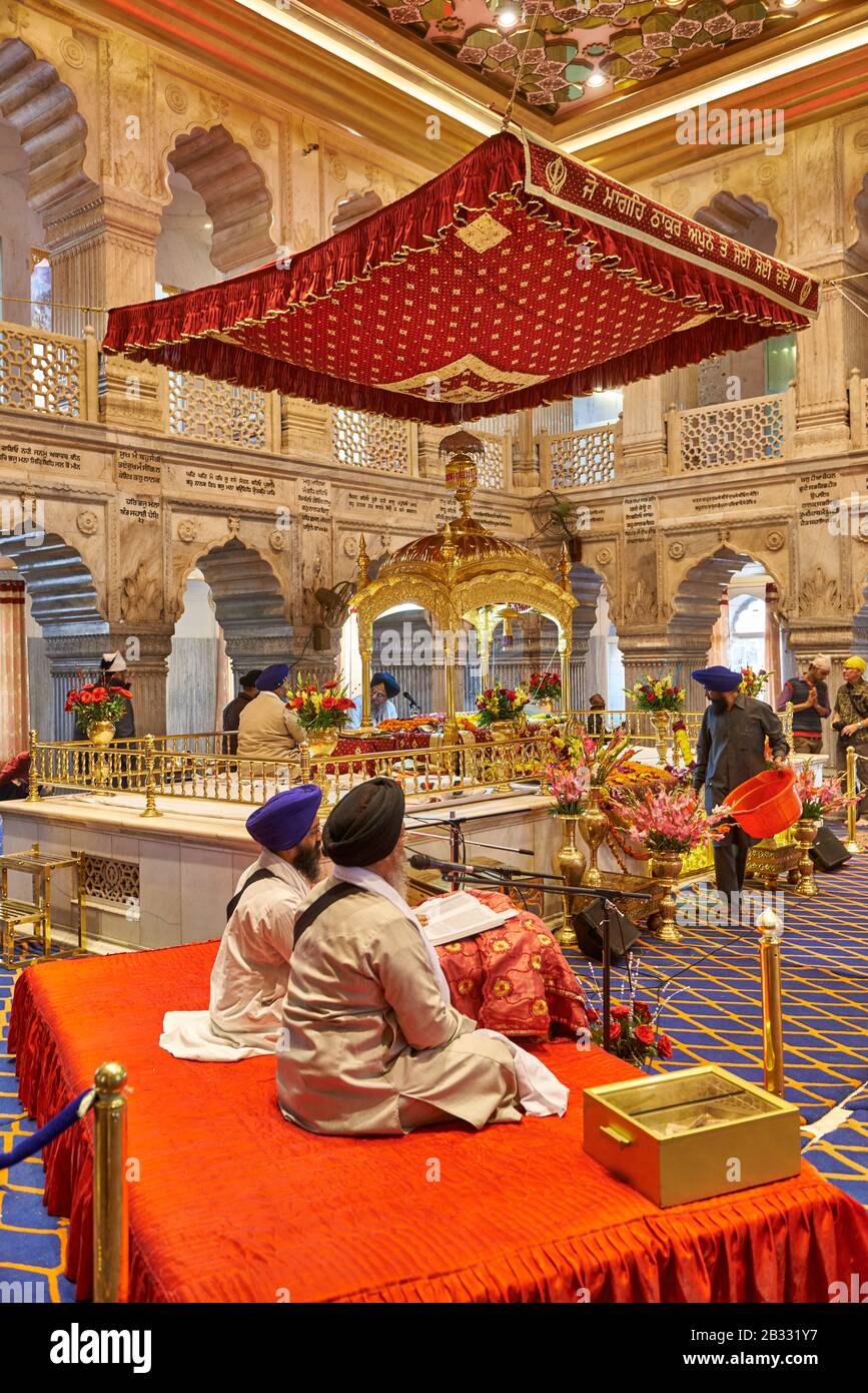 Sikhs Praying In Gurdwara