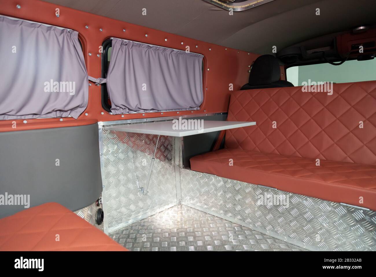 The interior of the car in the back of a van converted into a motor ...