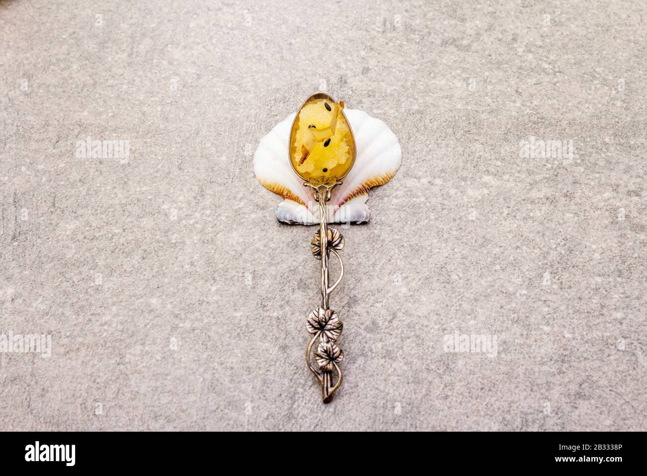 Capelin roe in seashells. Black sesame seeds with bonito flakes ...