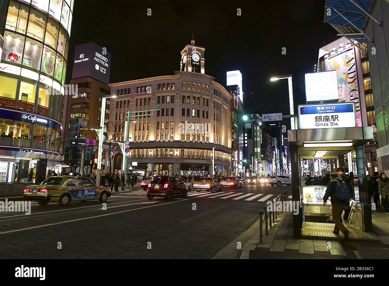 Shopping street and entrance to underground station Ginza Tokyo Japan ...