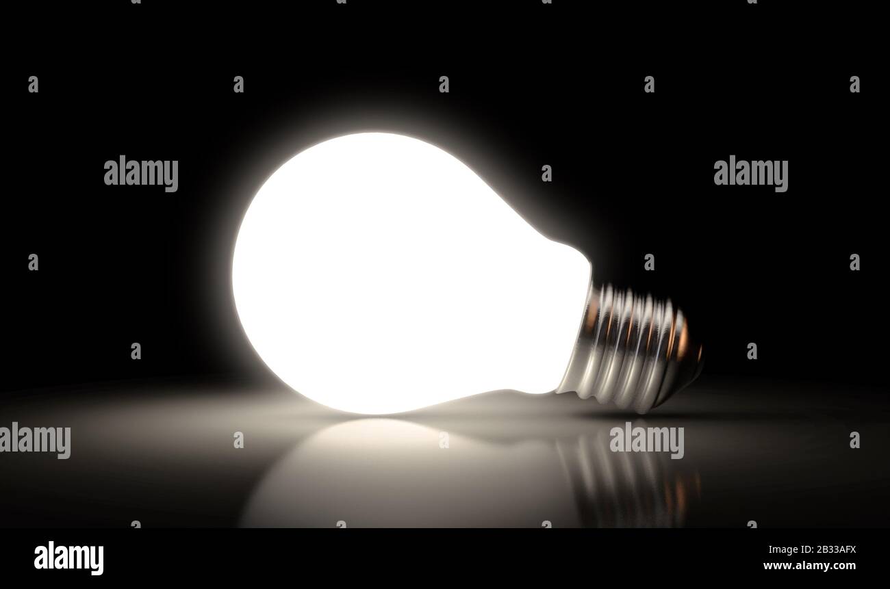 A concept of a disconnected standard light bulb brightly illuminated on ...