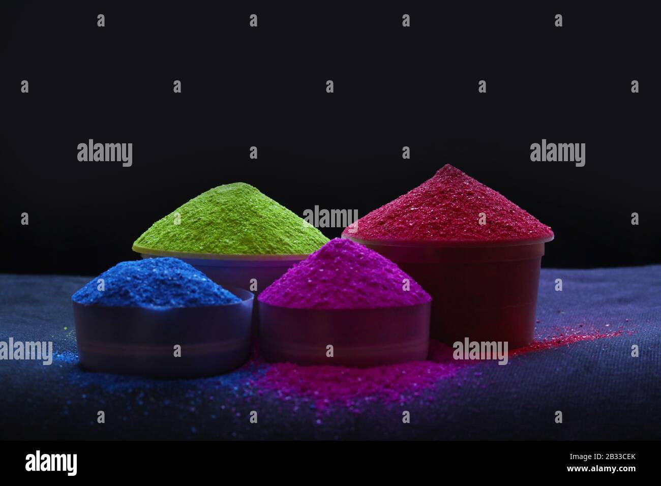 Concept: Indian colours holi festival. Colorful gulal (powder colors ...