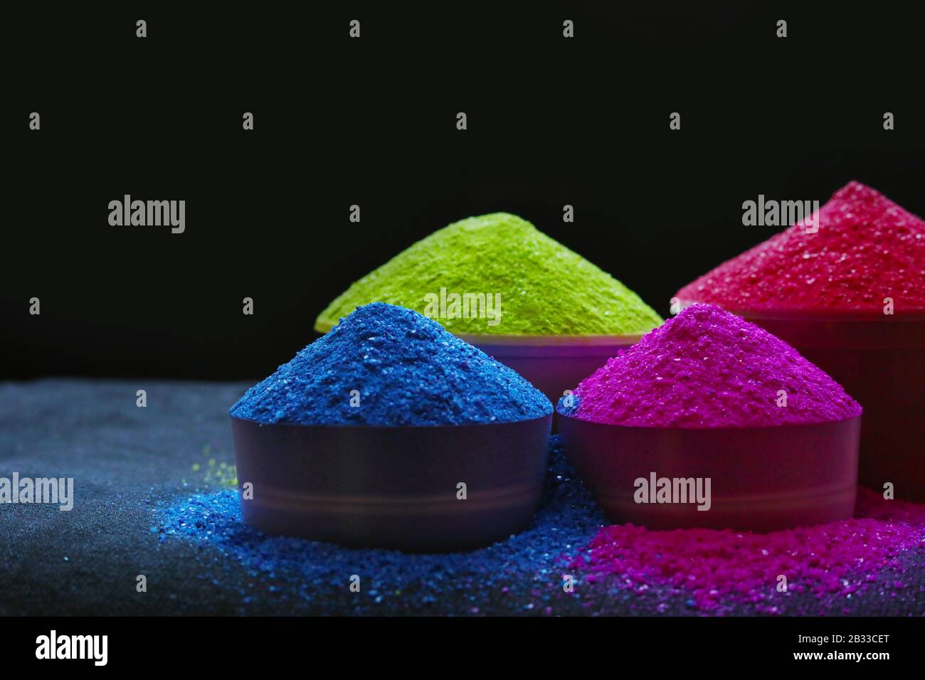 Concept: Indian colours holi festival. Colorful gulal (powder colors ...