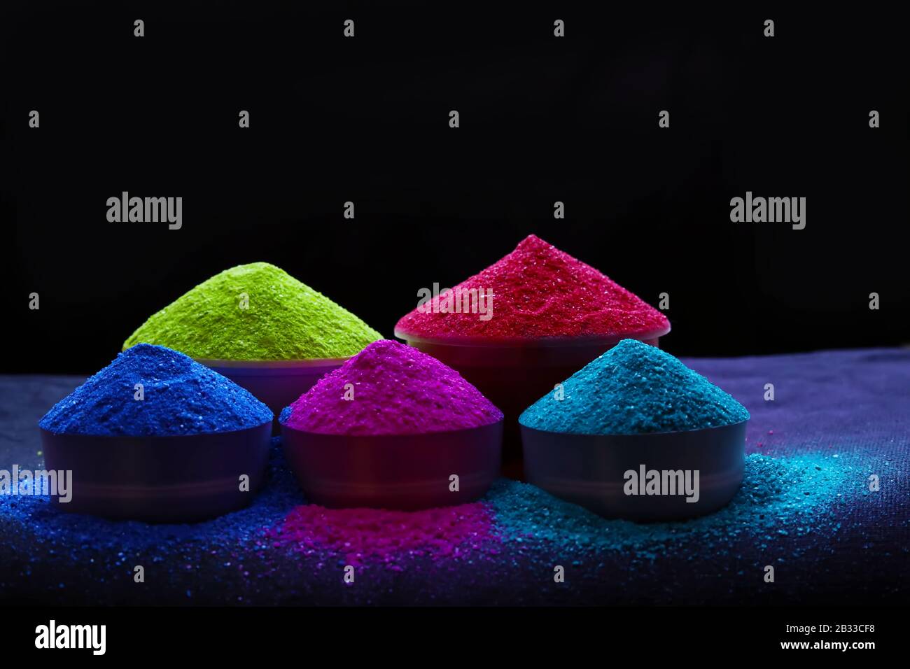 Bright colours for Indian holi festival. Colorful gulal (powder colors ...