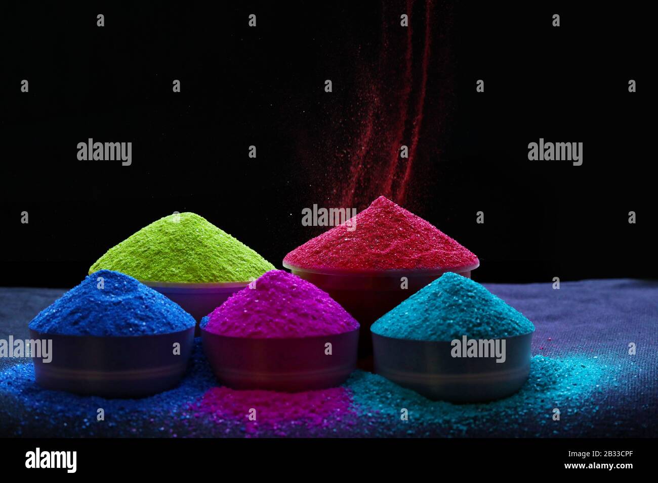 Bright colours for Indian holi festival. Colorful gulal (powder colors ...