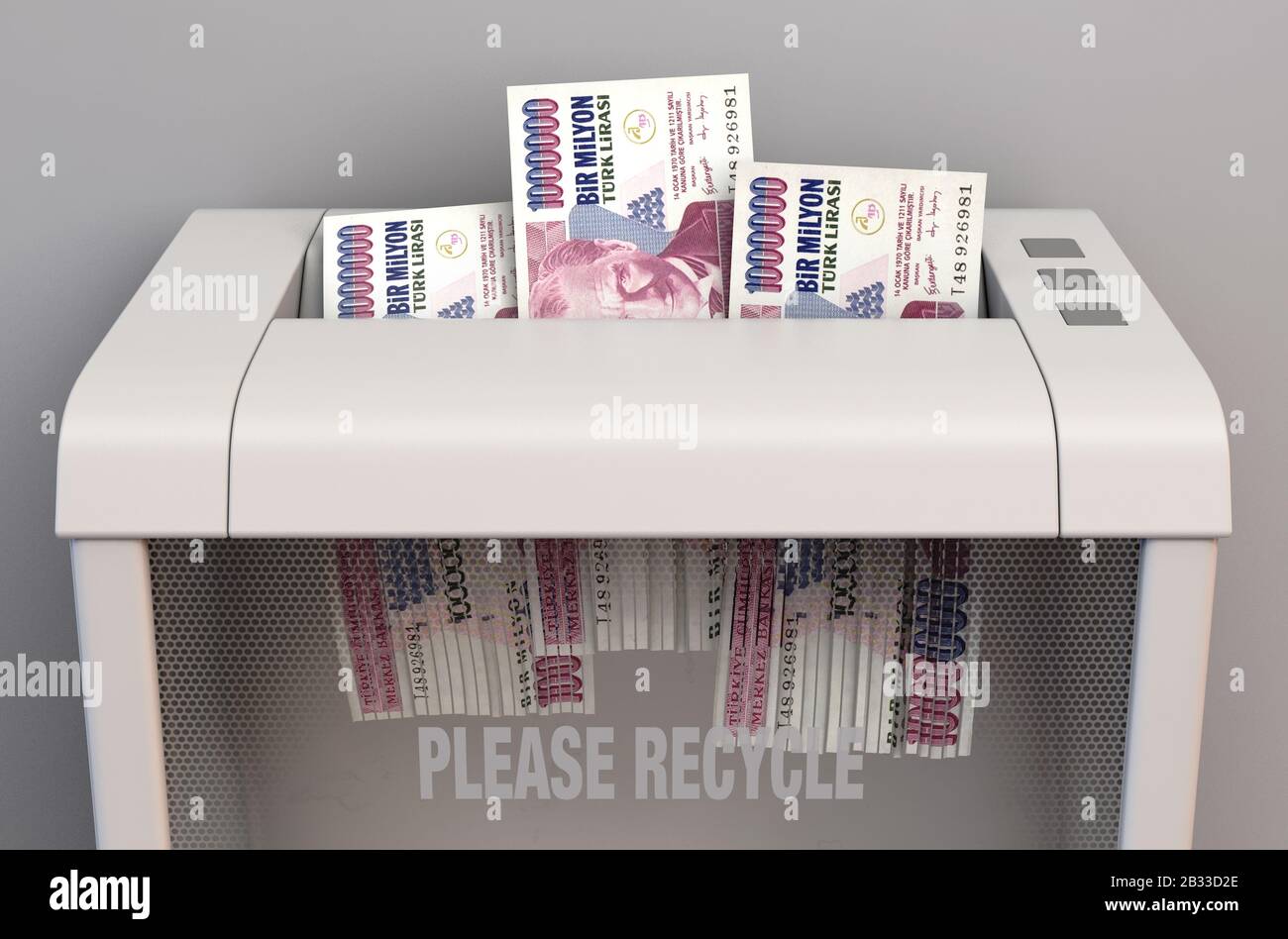 A regular office paper shredder in the process of shredding three ...