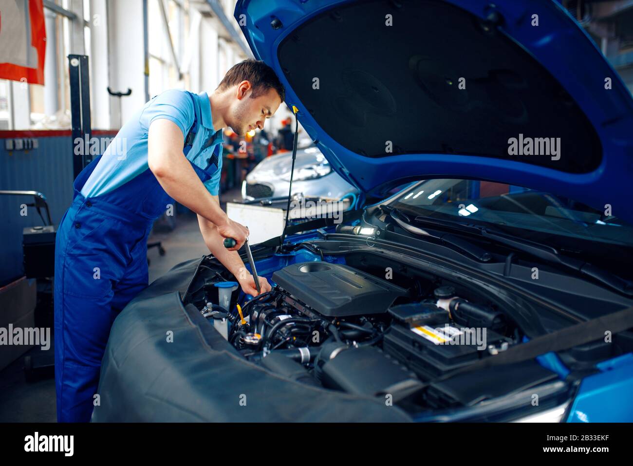 Worker in uniform checks hi-res stock photography and images - Alamy