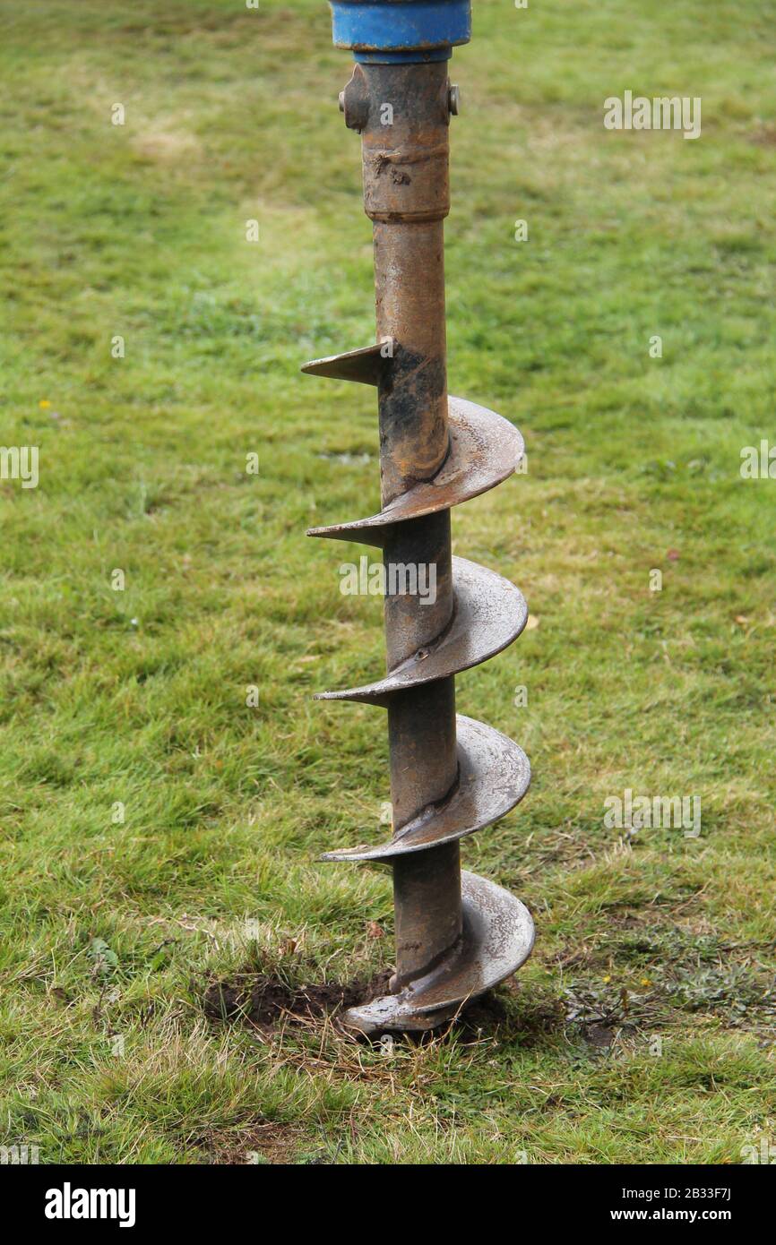 A Farming Auger Hole Drilling Tractor Attachment Stock Photo - Alamy