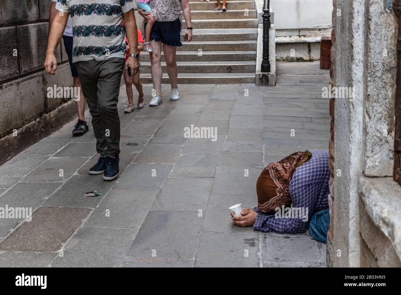 Women begging on the streets of Venice, Italy Stock Photo - Alamy