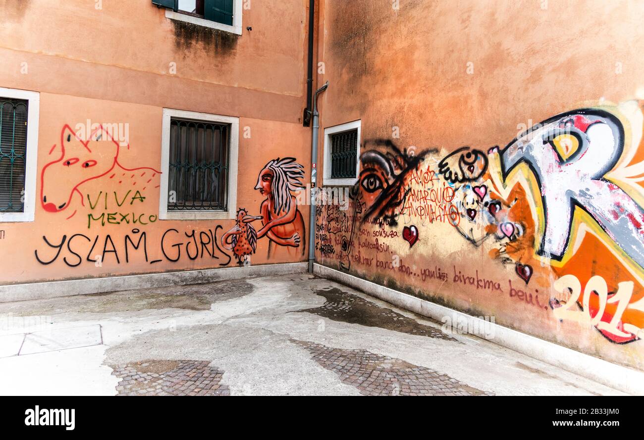 Graffiti on street walls, Venice, Italy Stock Photo - Alamy