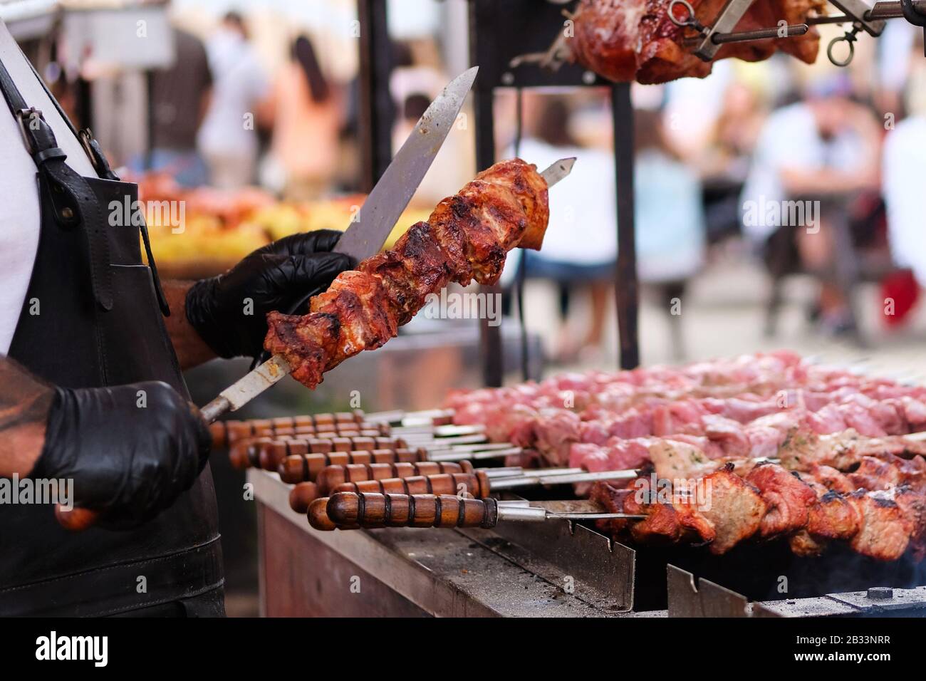 Black apron hi-res stock photography and images - Alamy