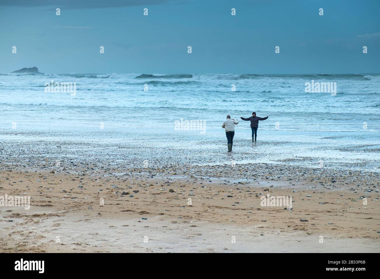 People enjoying themselves despite the cold chilly weather conditions ...