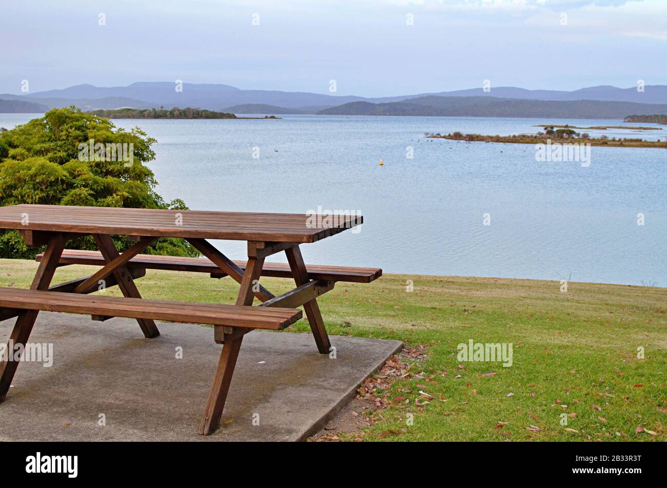 Picnic bench and table at a park in Australia with beautiful sea view ...