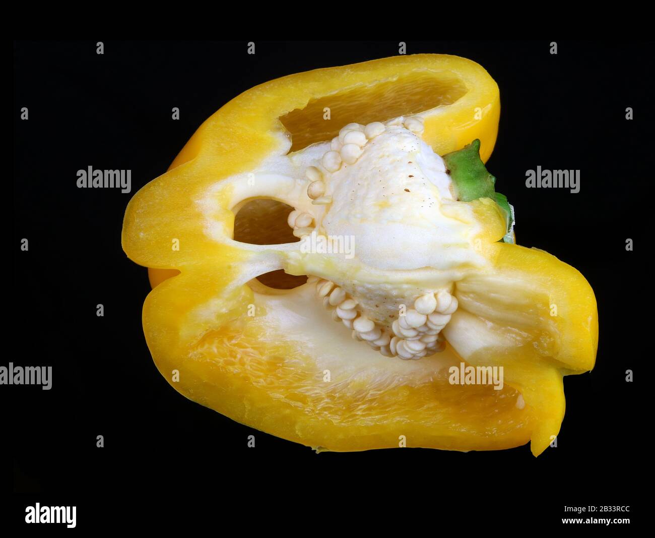 The cross section of the sweet yelow paprika pepper seeds inside ...