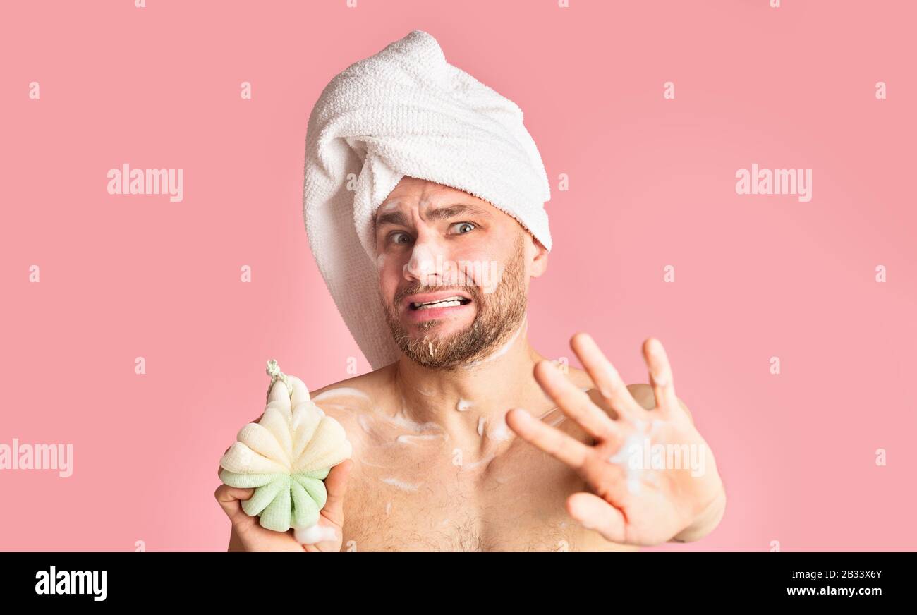 Guy takes a shower and closes with hand Stock Photo - Alamy Guy takes a shower and closes with hand Stock Photo - Alamy