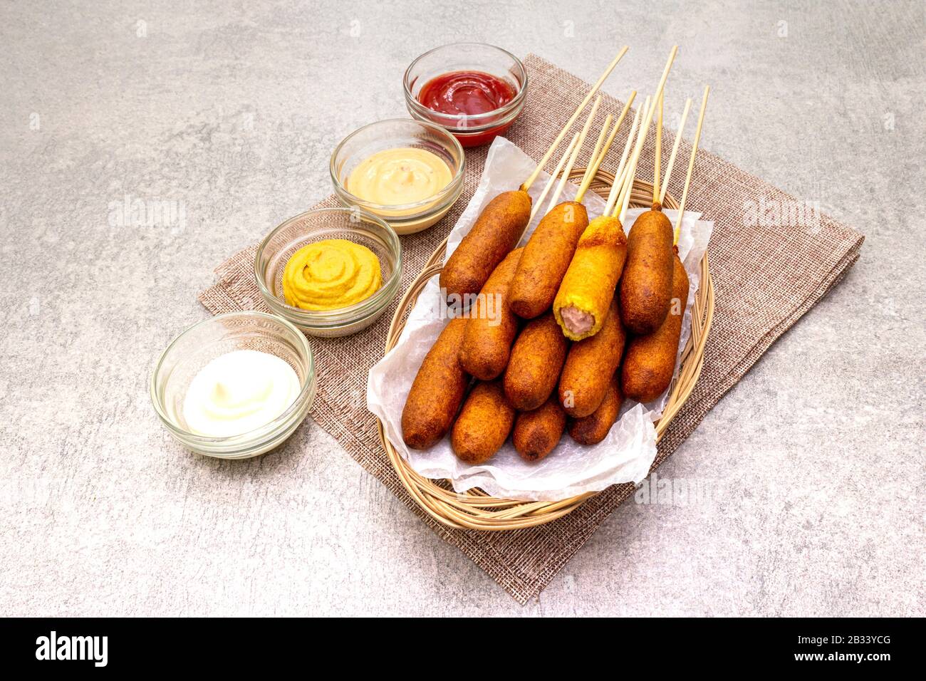 Corn dogs homemade with popular sauces. Traditional American street ...