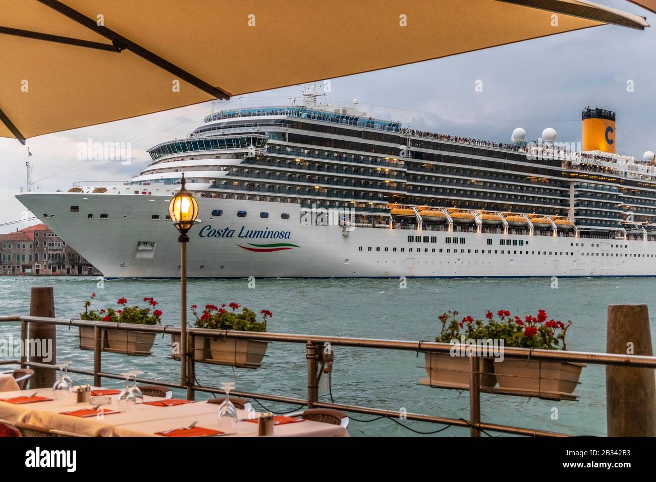 Massive cruise ship, Costa Luminosa, dominating the skyline of Venice ...