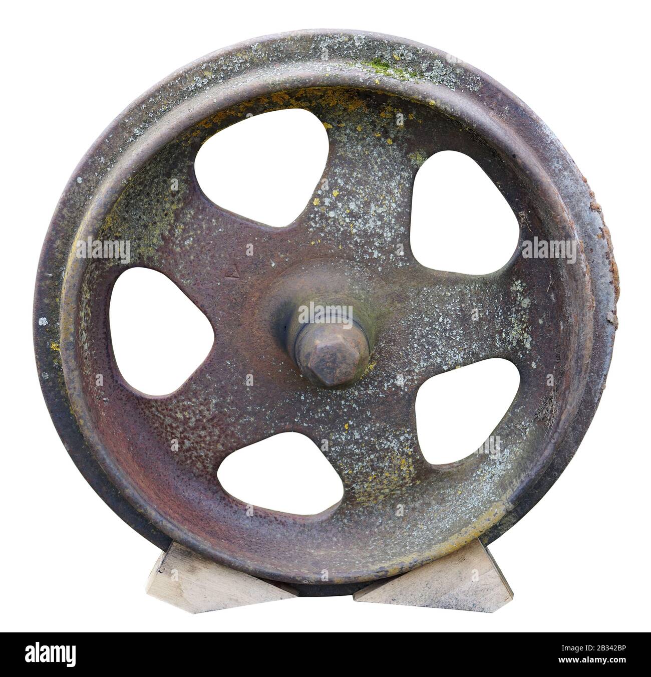 Rusty cast iron aged wheel from an retro agricultural tractor ansd ...