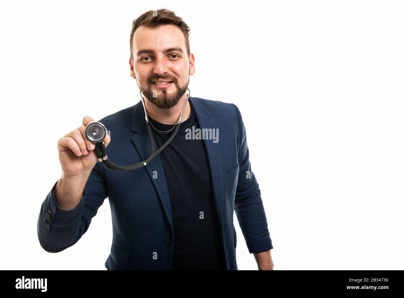 Medic wearing smart casual clothes using stethoscope isolated on white ...