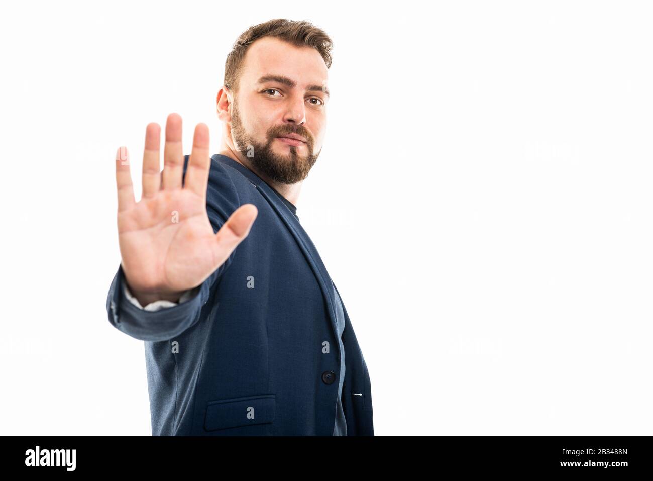 Business man wearing smart casual clothes showing stop gesture isolated ...
