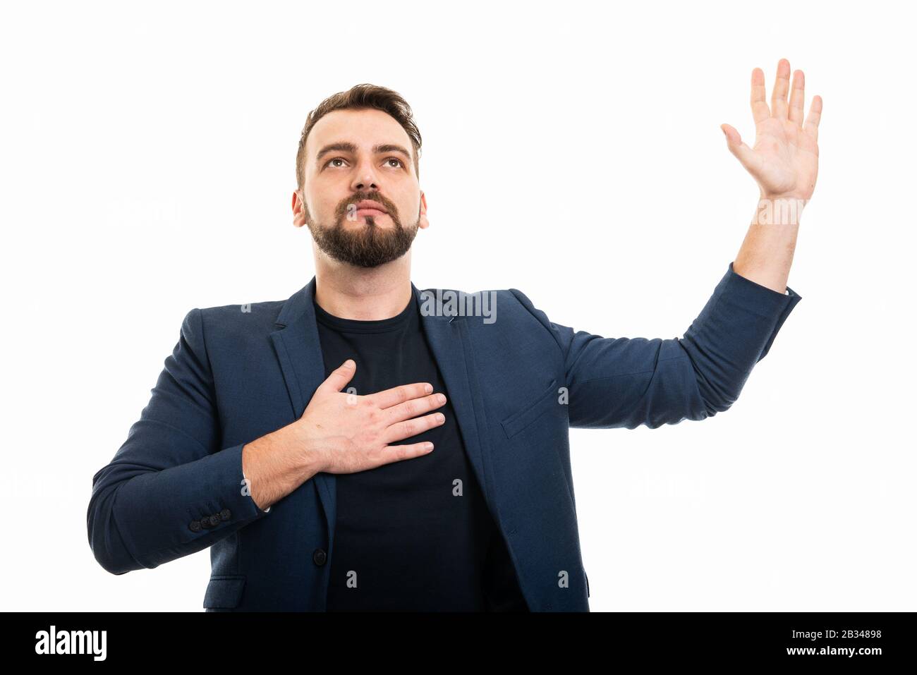Business man wearing smart casual clothes taking oath gesture isolated ...
