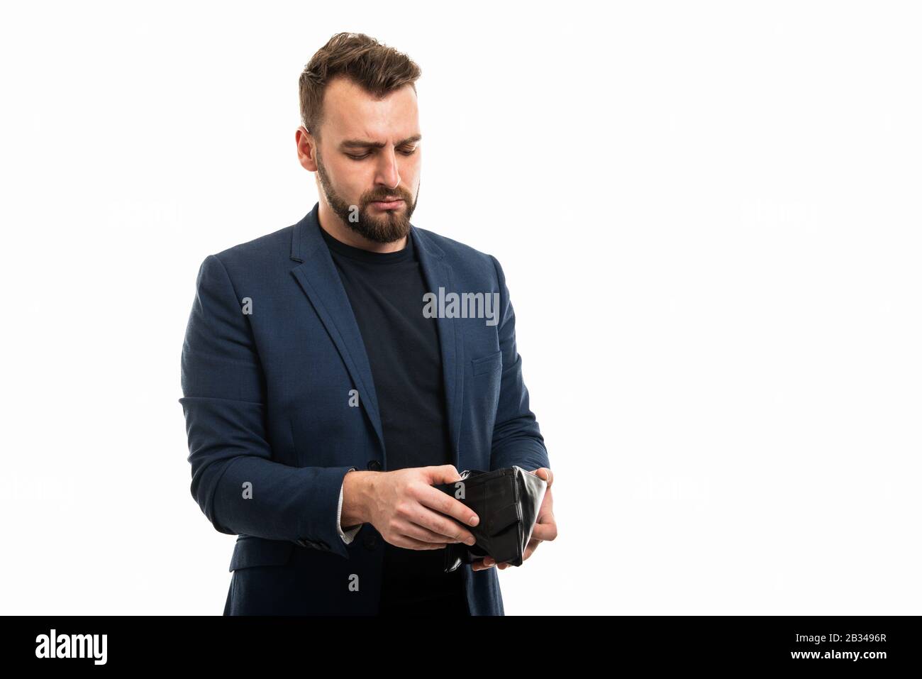 Business man wearing smart casual clothes looking in empty wallet ...