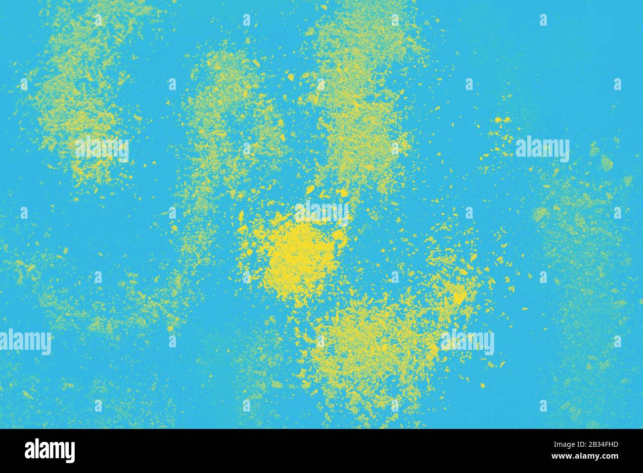 Abstract blue background with yellow powder spots Stock Photo - Alamy
