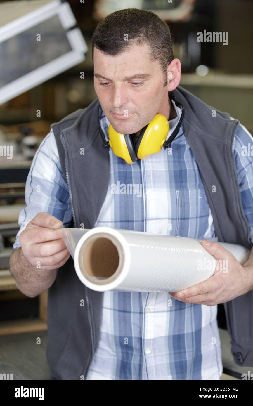 engineer works in printing industry Stock Photo - Alamy
