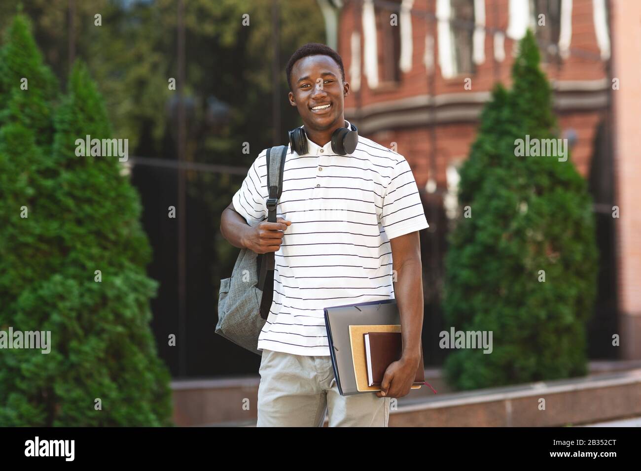 African college boy standing outdoors hi-res stock photography and ...