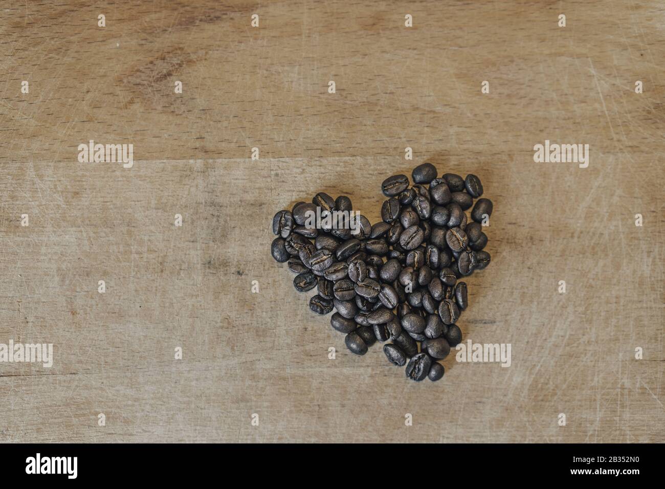 Coffee beans shaped to a heart Stock Photo - Alamy