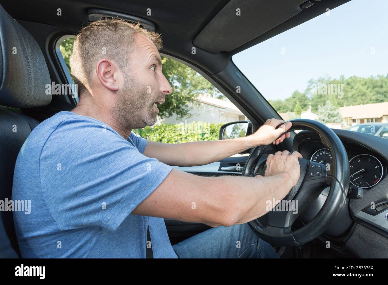 furious male driver honking the car horn Stock Photo - Alamy