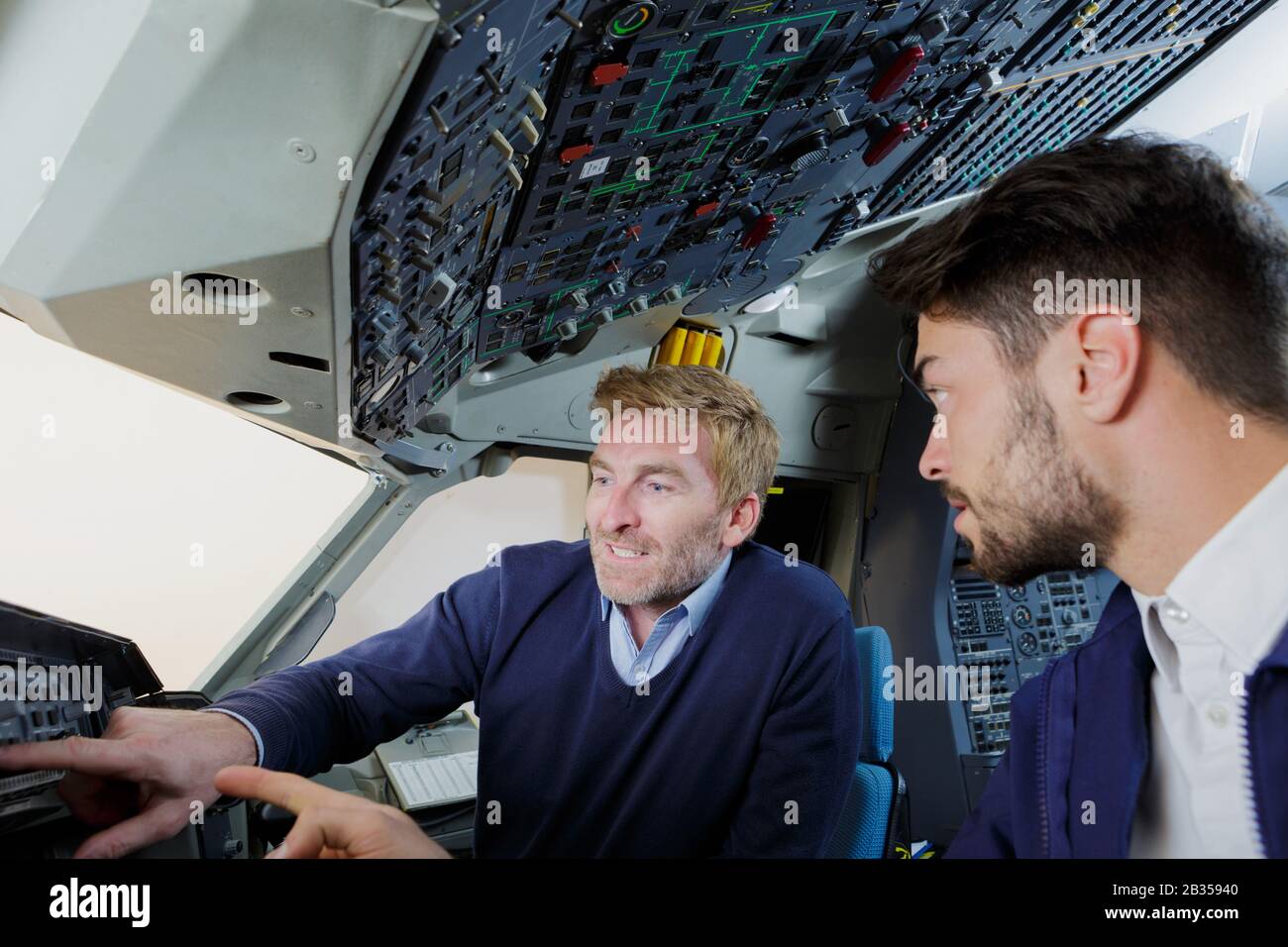 Male airport workers checking hi-res stock photography and images - Alamy