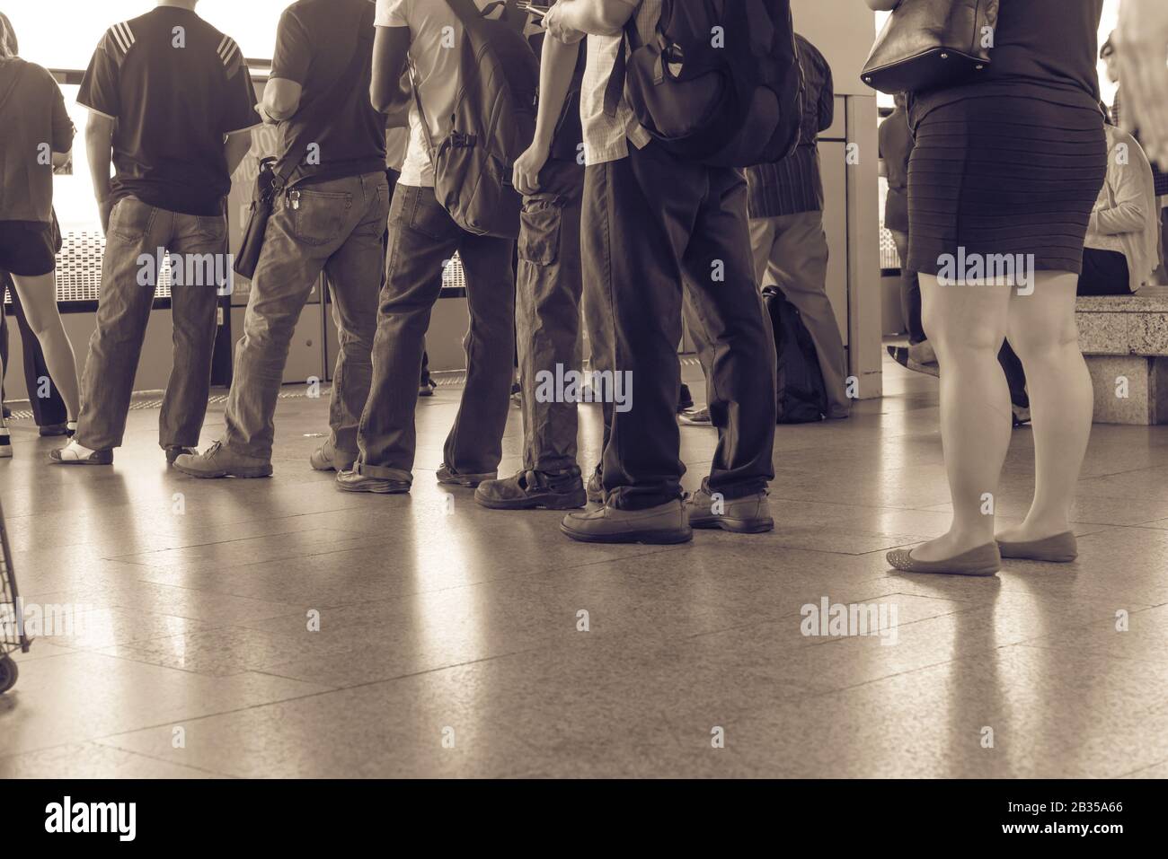 Toned photo diverse people waiting in line at MRT Mass Rapid Transit ...