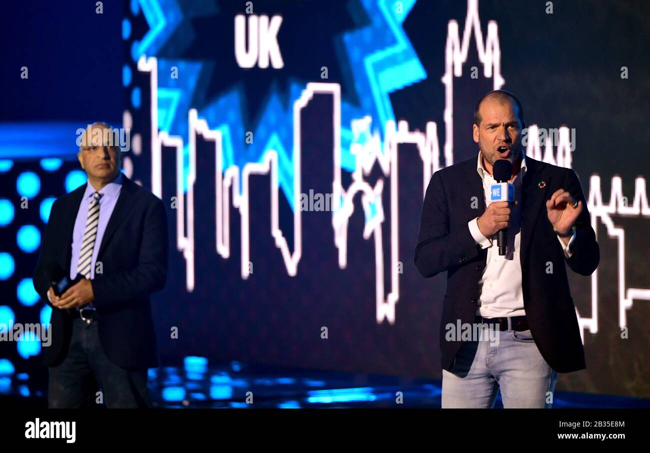 Kees Kruythoff and Rumi Verjee (left) on stage at the WE Day UK charity ...