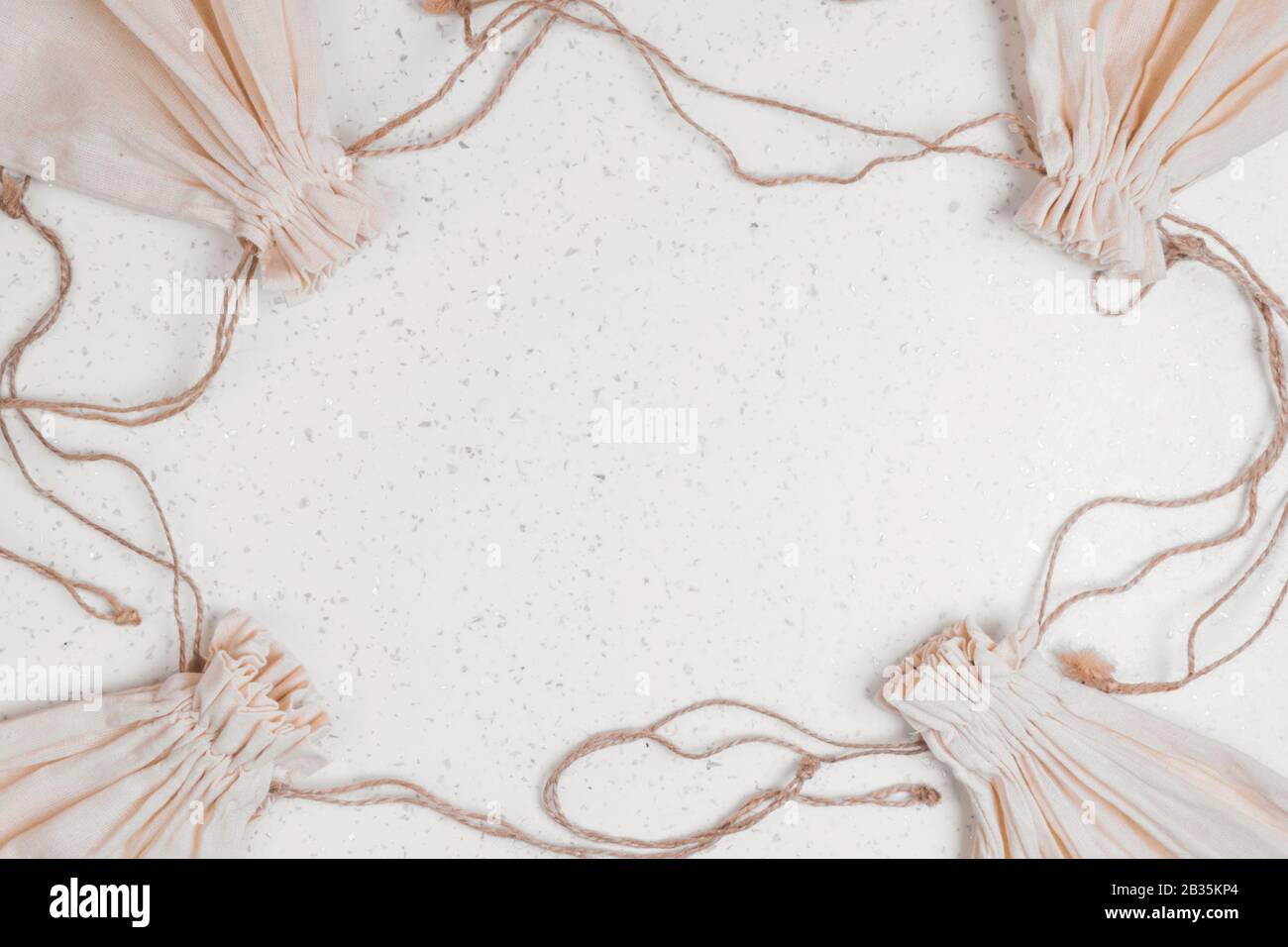 empty purse string cotton bags on white background, concept for save ...