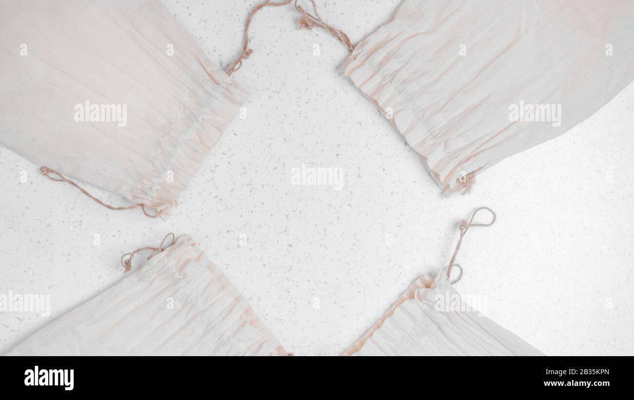 empty purse string cotton bags on white background, concept for save ...