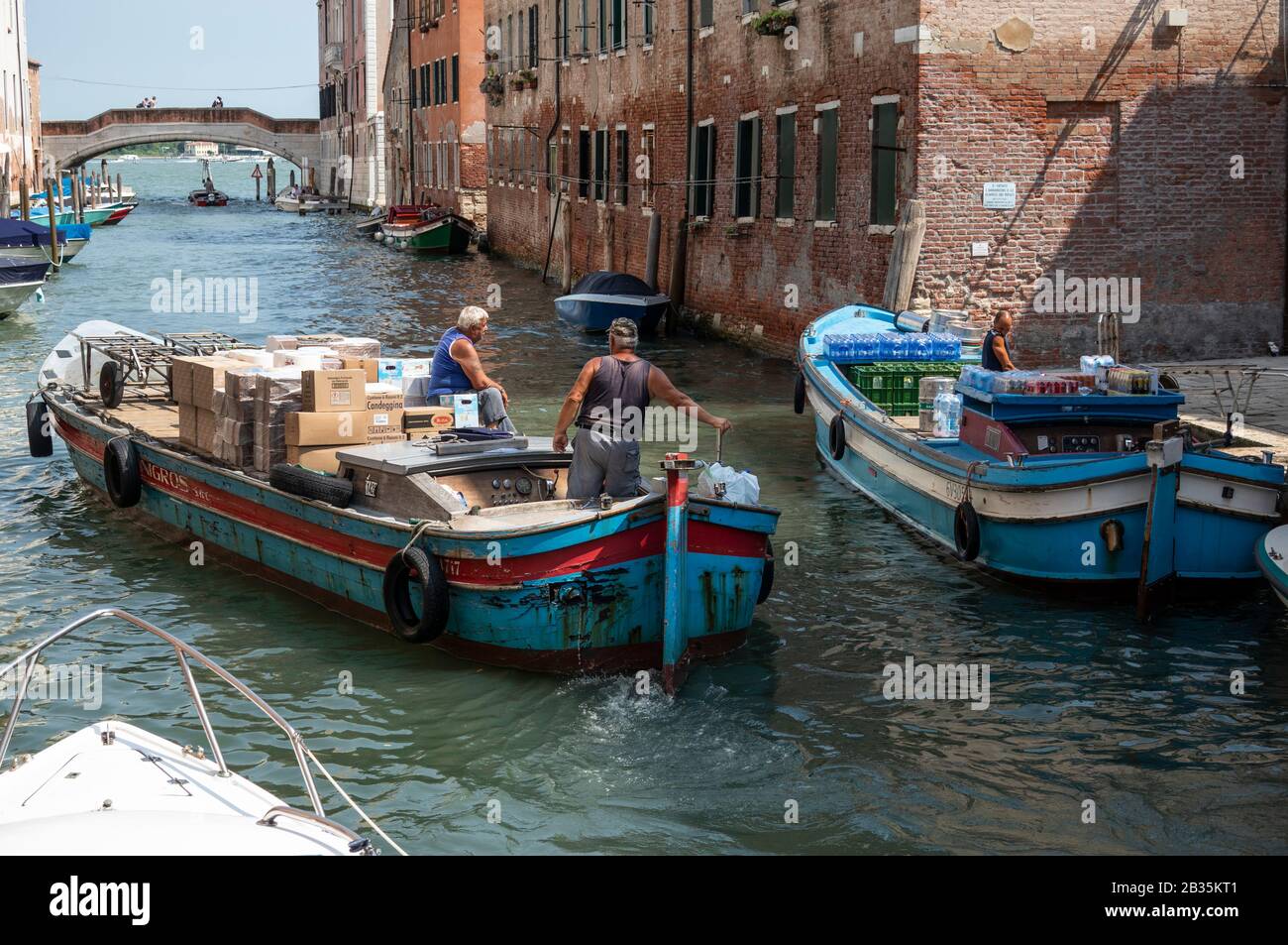 Goods being delivered by barge, canal, Venice, Italy Stock Photo - Alamy
